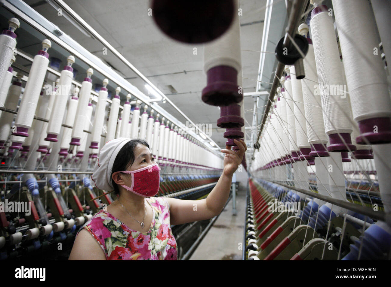 Garment factory worker southeast asia hi-res stock photography and images - Alamy