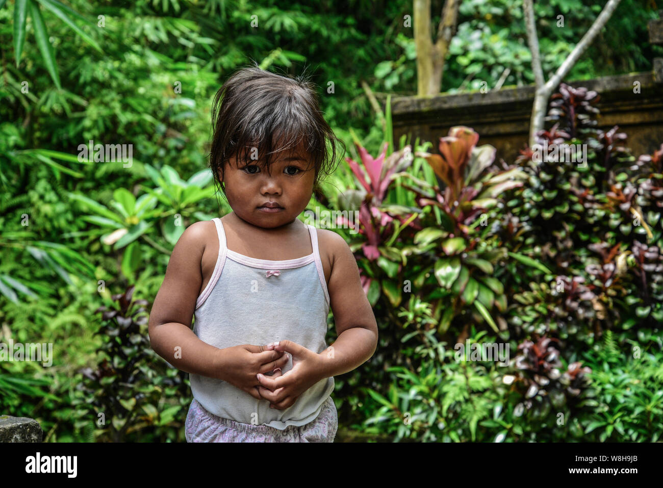 BALI, INDONESIA - JANUARY 9, 2018: Cute little ethnic balinese kid in ...