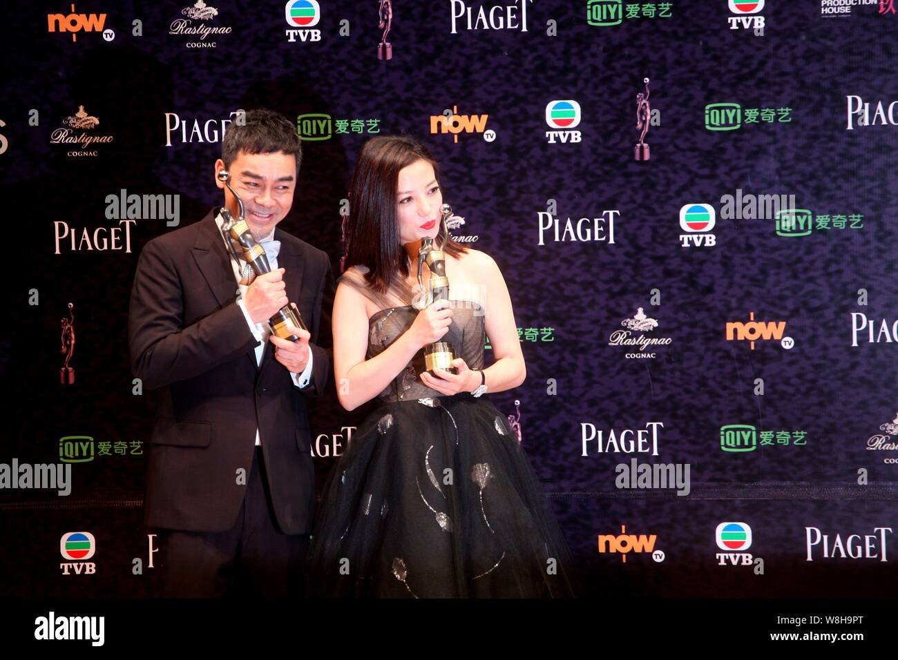 Chinese actress Zhao Wei, right, and Hong Kong actor Sean Lau pose with ...