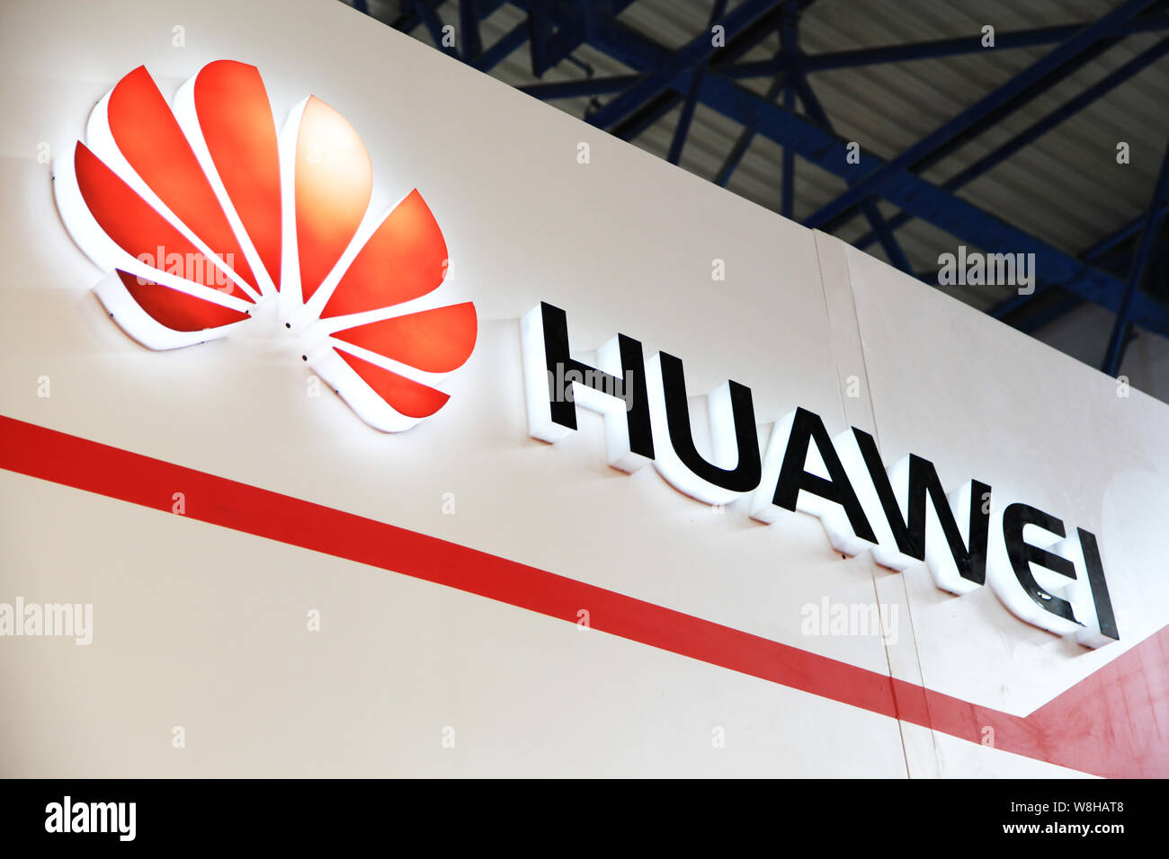 --FILE--A signboard of Huawei is pictured during a fair in Beijing ...