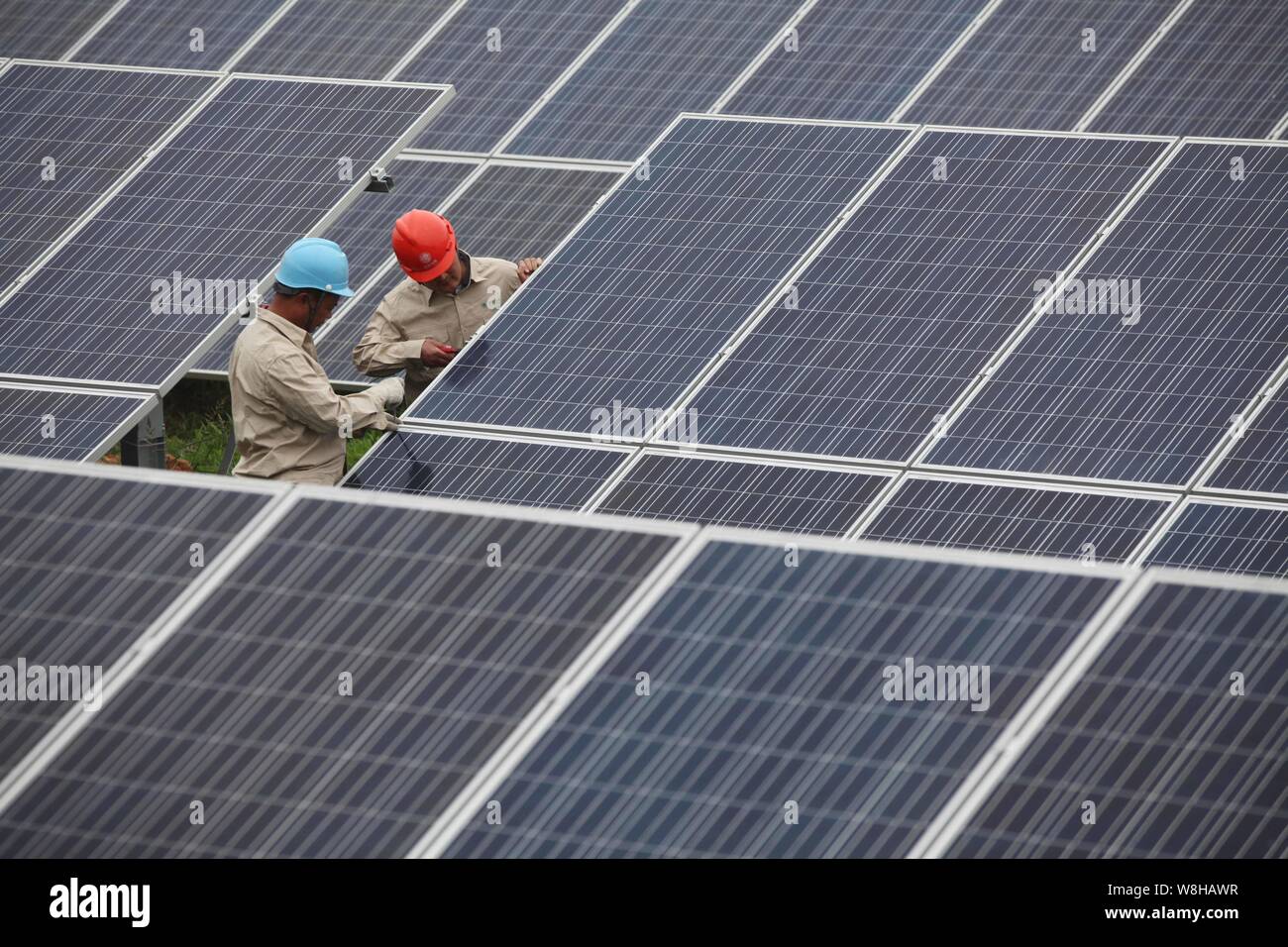 Install solar panels hi-res stock photography and images - Alamy
