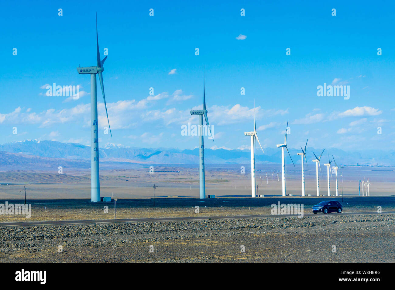 --FILE--Wind turbines manufactured by Mingyang Electric whirl to ...