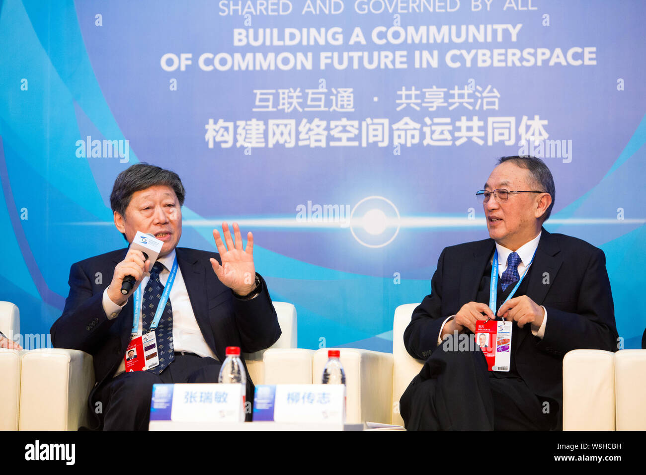 Zhang Ruimin, left, Chairman of Haier Group, speaks next to Liu ...