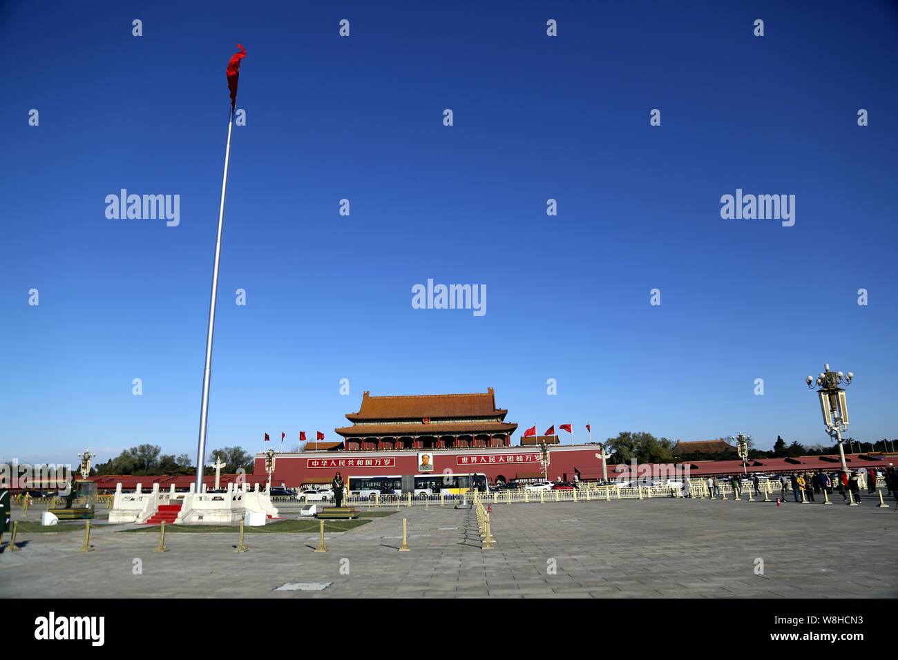 Tiananmen Square is pictured under a blue sky after days of heavy smog ...