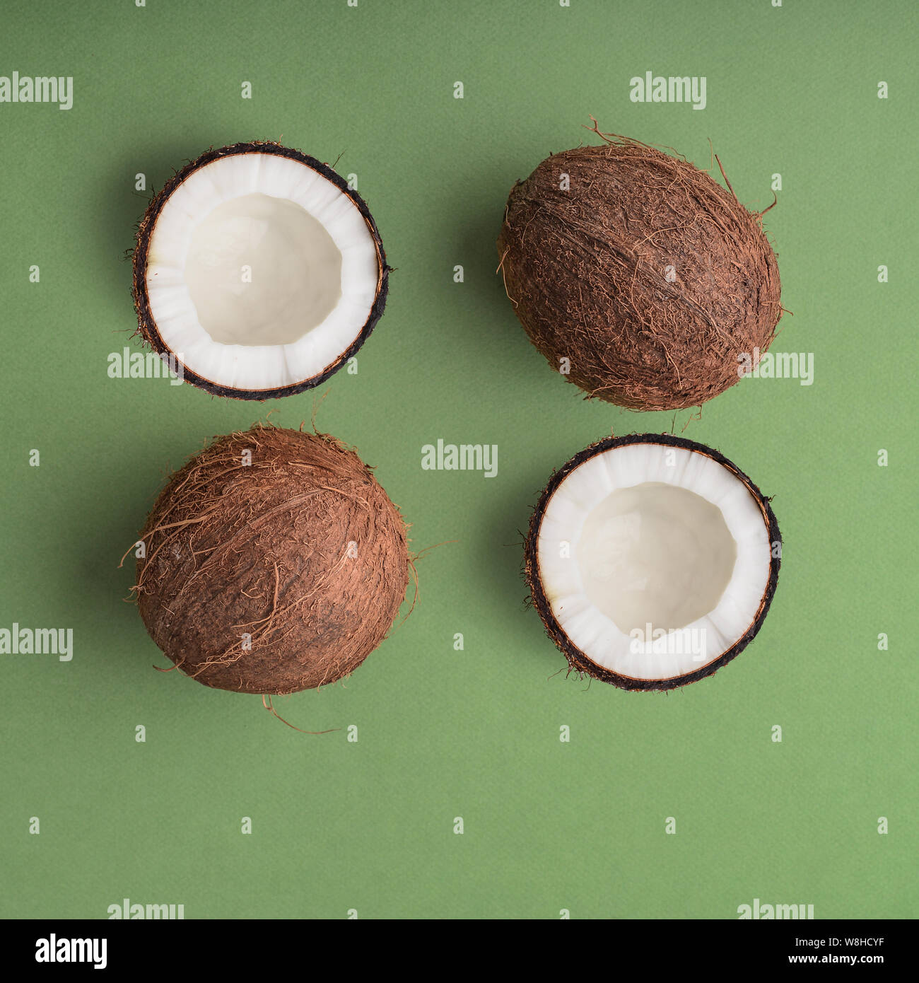 Tropical abstract background. Coconuts on the green background. Top ...