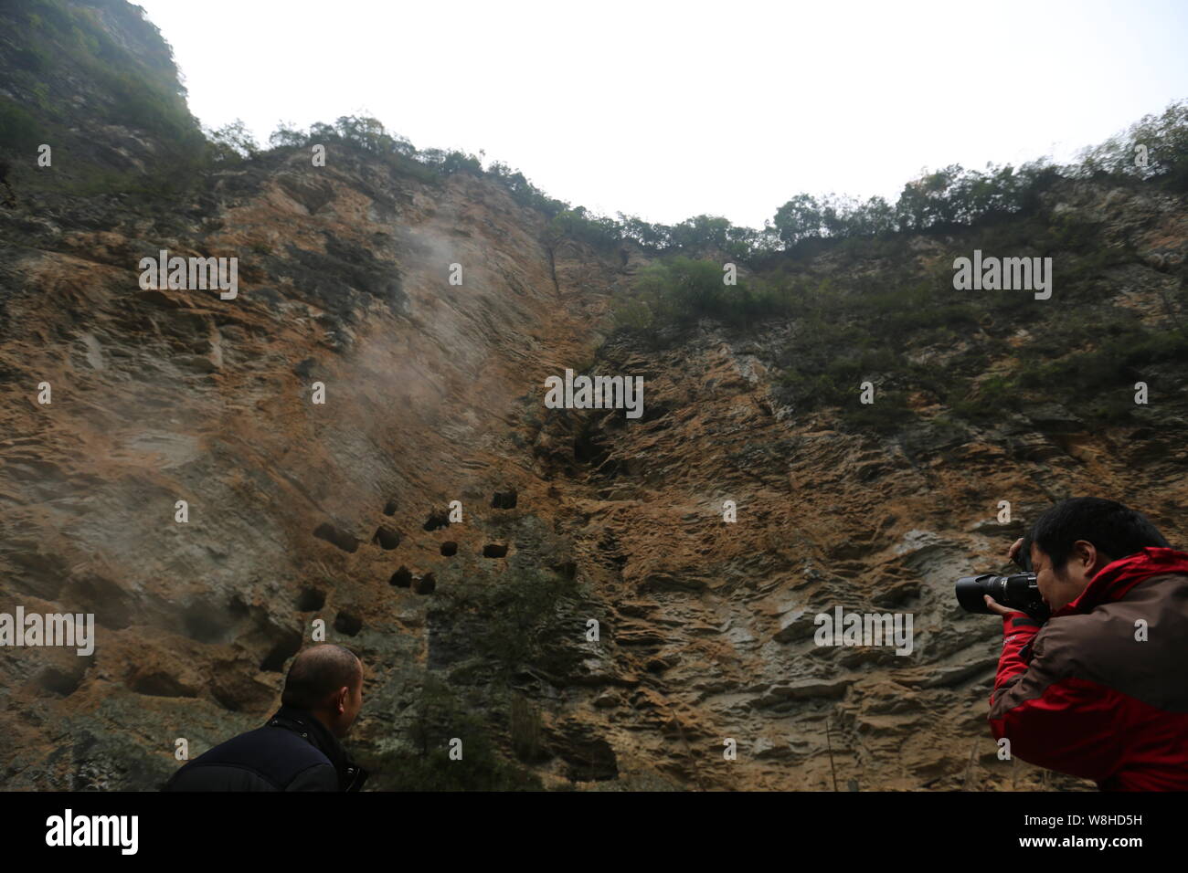 View of ancient Chinese 'hanging' coffins on the side of a 100 metre ...