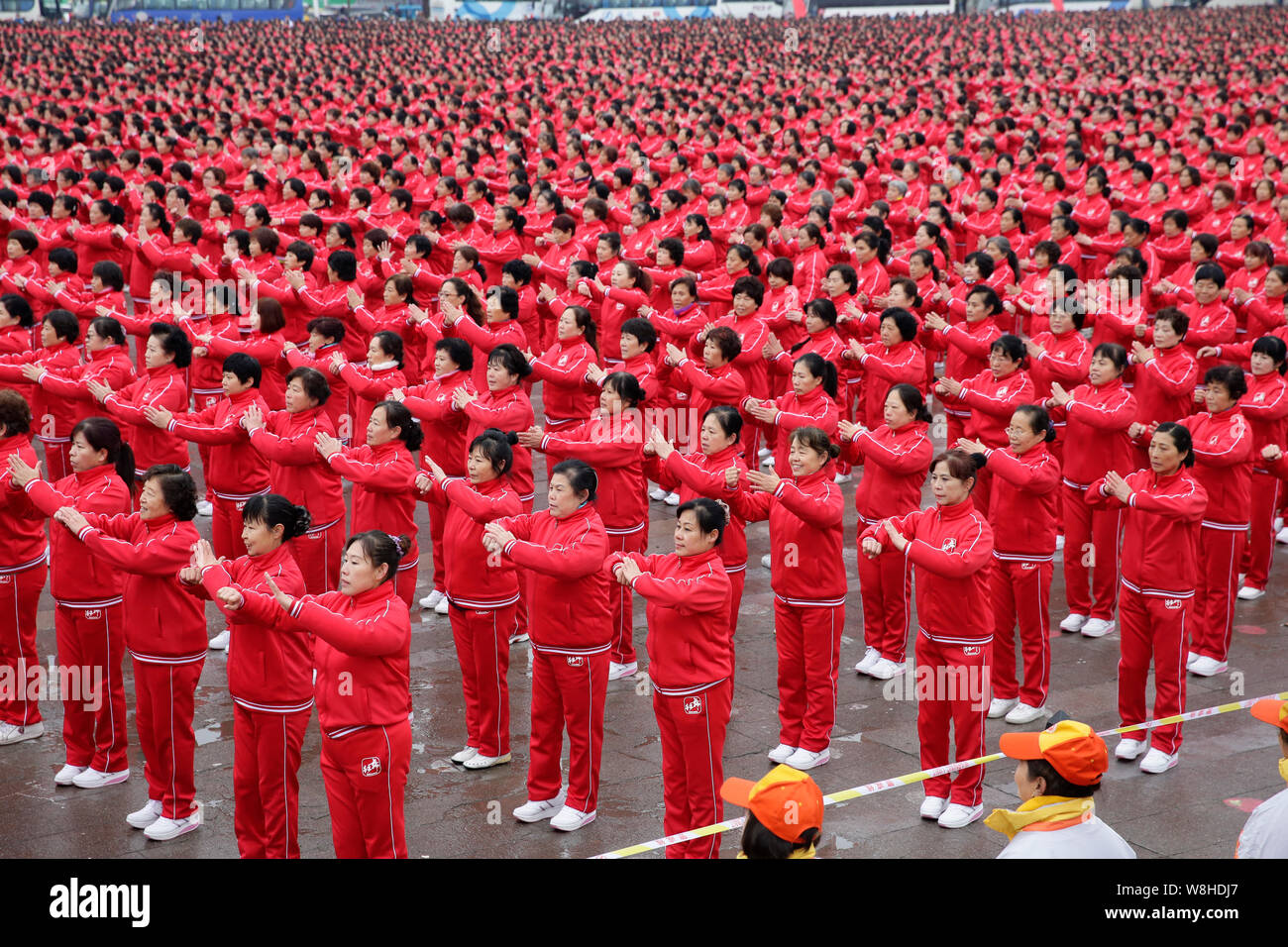 Local Chinese residents take part in the largest line dance on a square ...