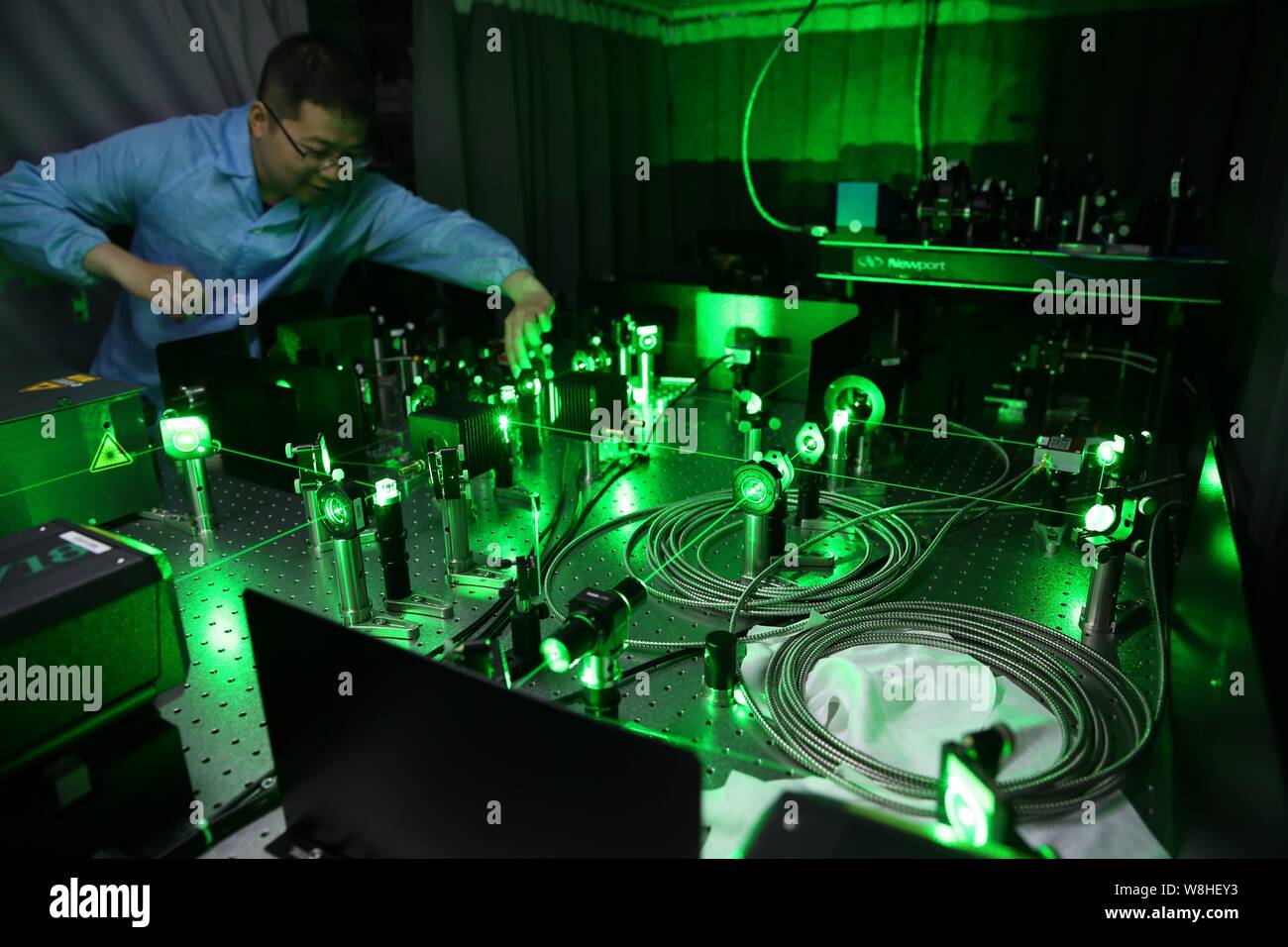 A Chinese researcher works on an ultracold atom device at the CAS ...