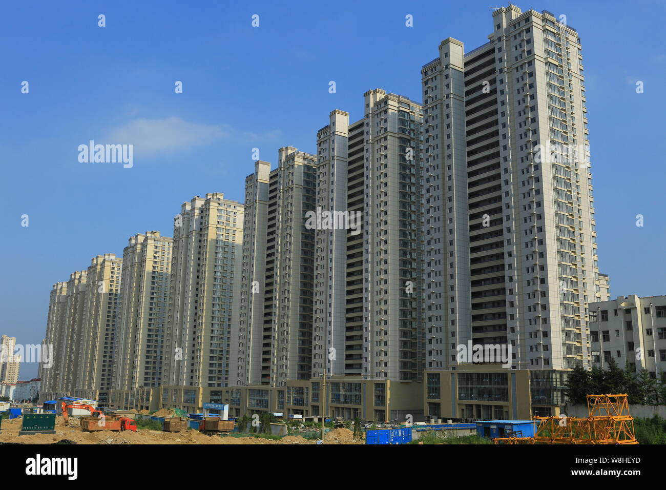 --FILE--Newly-built high-rise residential apartment buildings are ...