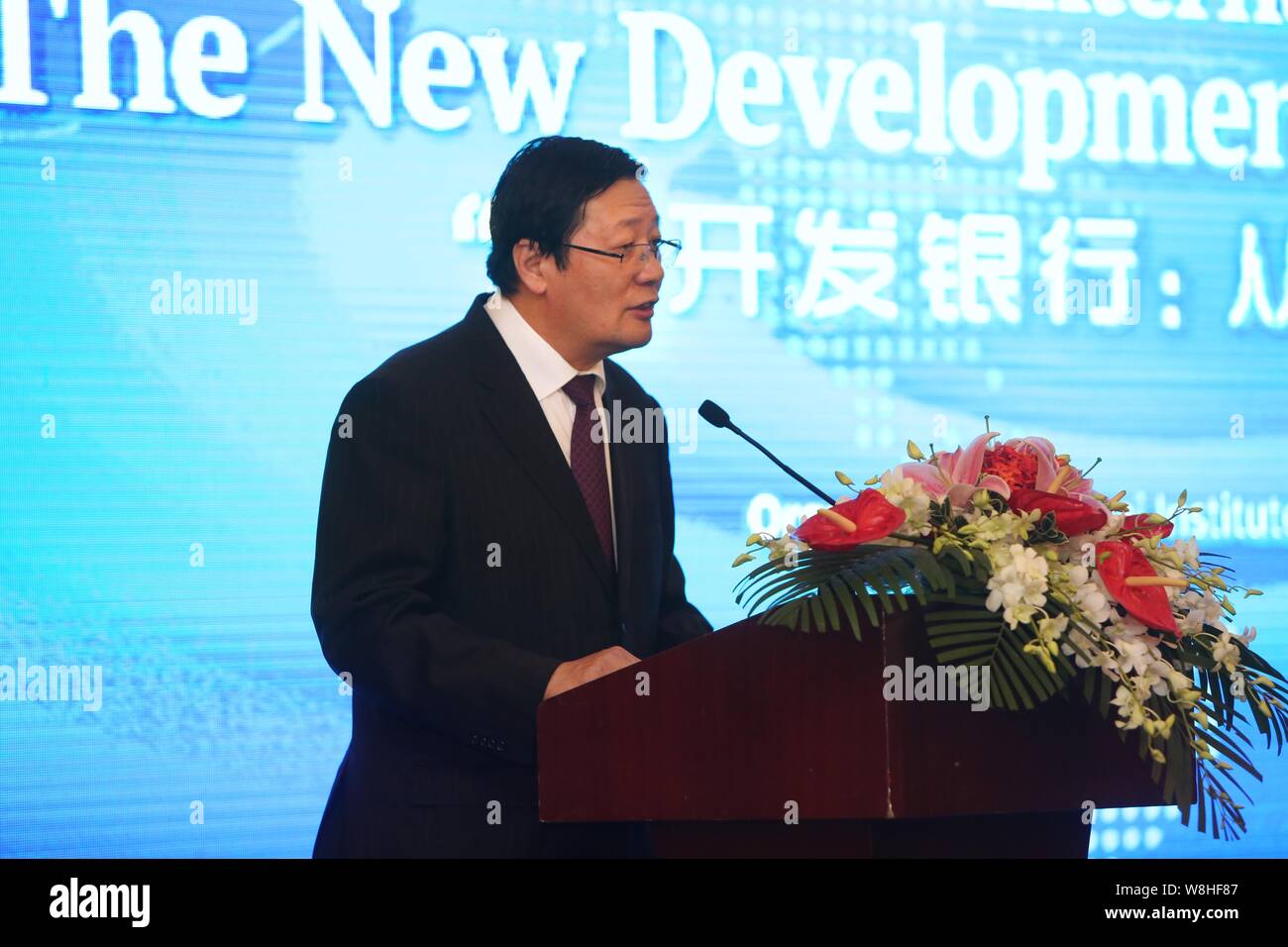 Chinese Finance Minister Lou Jiwei delivers a speech at the ...