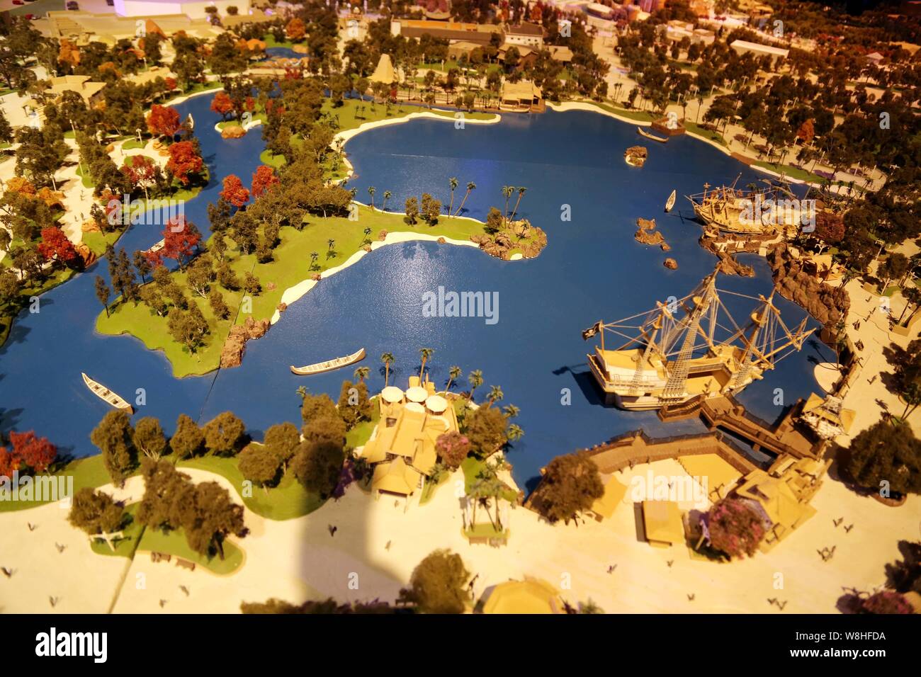 A scale model of the Shanghai Disney Resort is on display during its ...