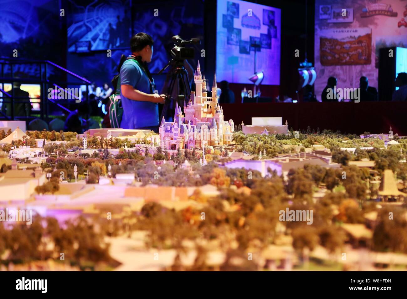 A scale model of the Shanghai Disney Resort is on display during its ...