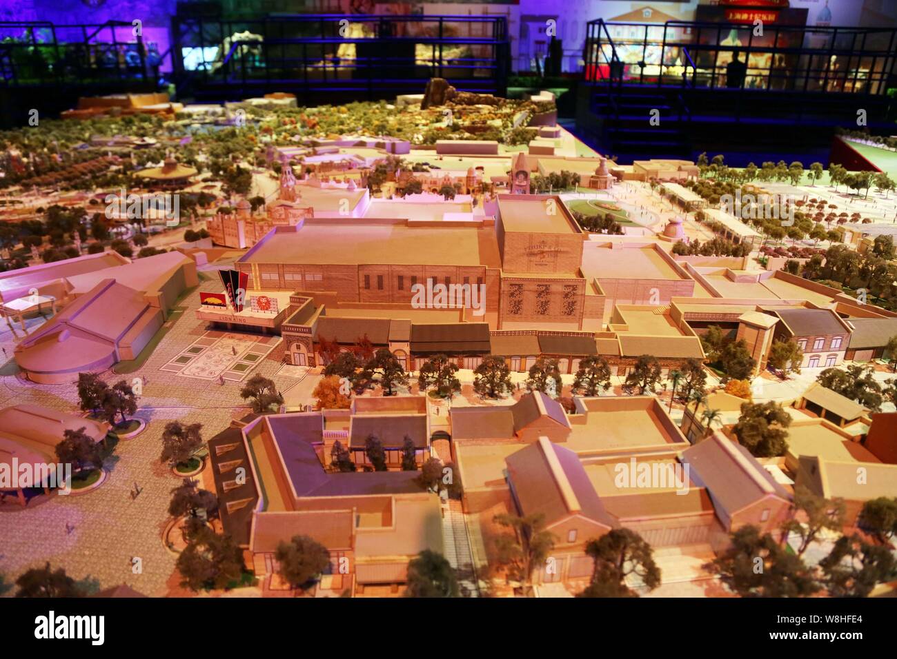 A scale model of the Shanghai Disney Resort is on display during its ...
