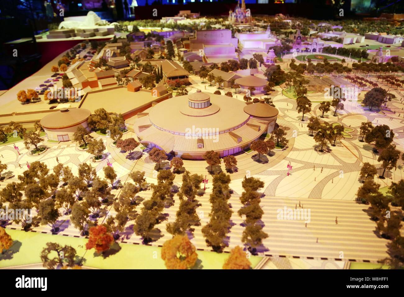 A scale model of the Shanghai Disney Resort is on display during its ...