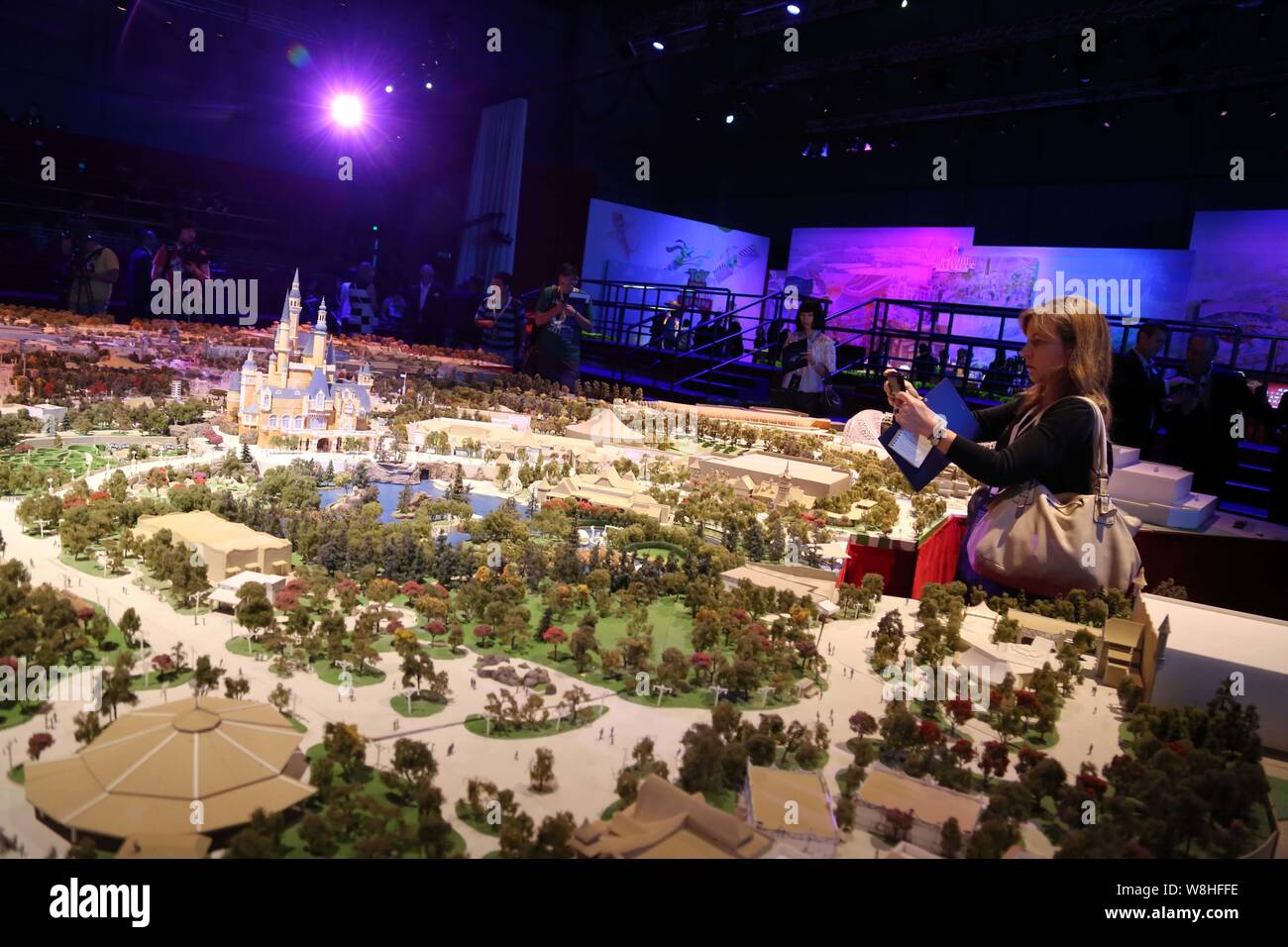 A scale model of the Shanghai Disney Resort is on display during its ...