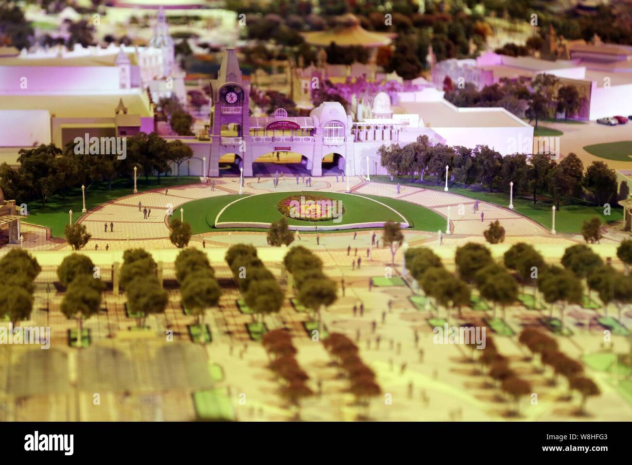 A scale model of the Shanghai Disney Resort is on display during its ...