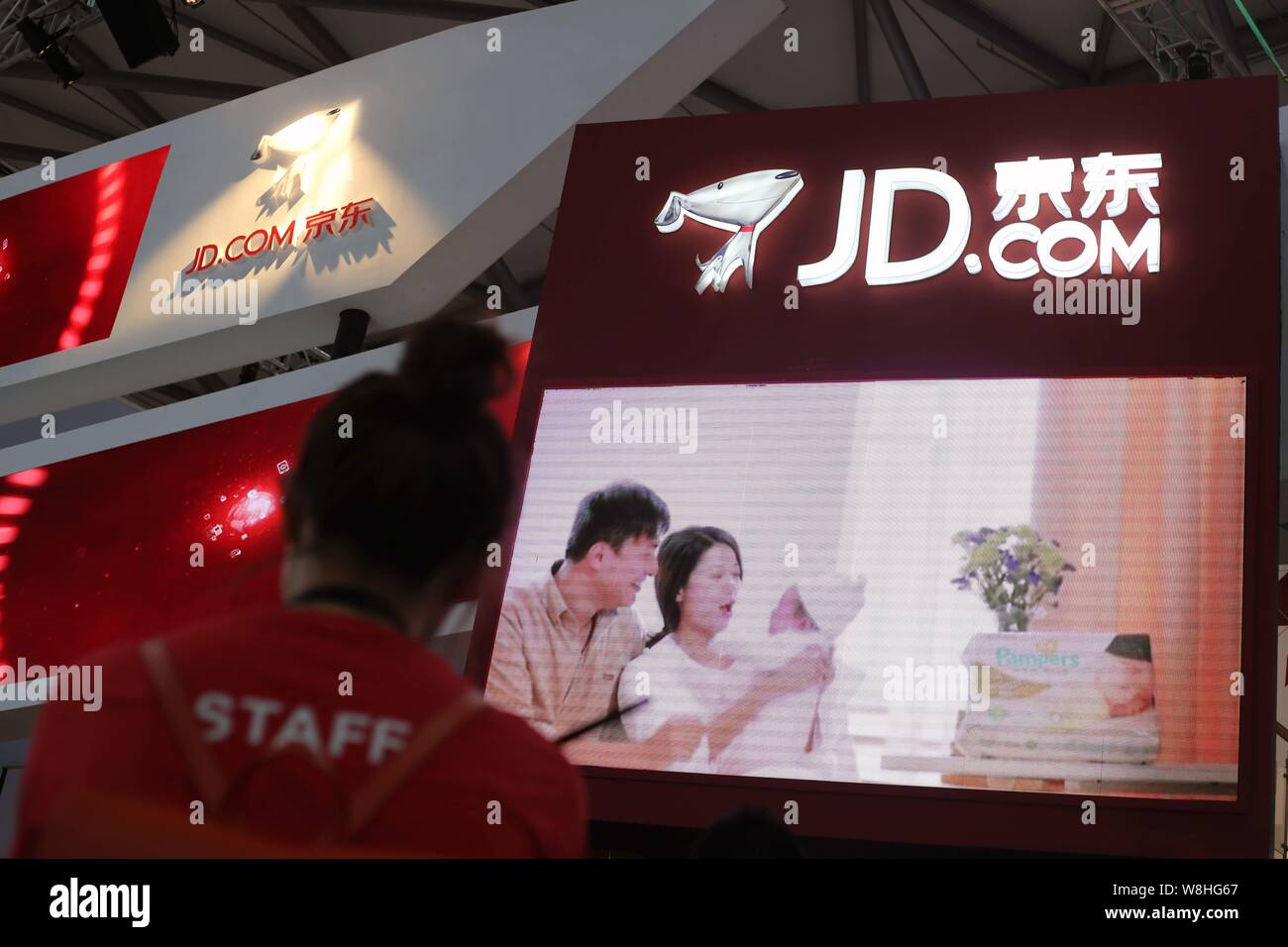 --FILE--A Chinese employee is seen at the stand of Chinese online ...