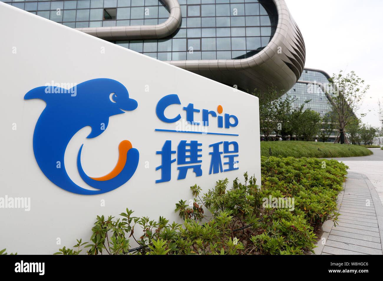 View of a signboard of Ctrip at the office building of Chinese online ...