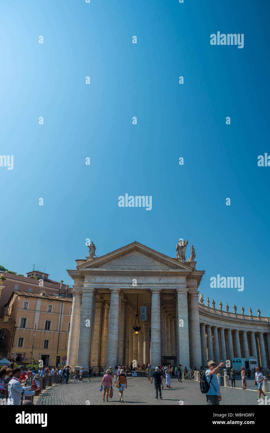 The colossal Doric colonnades, four columns deep, frame the trapezoidal ...