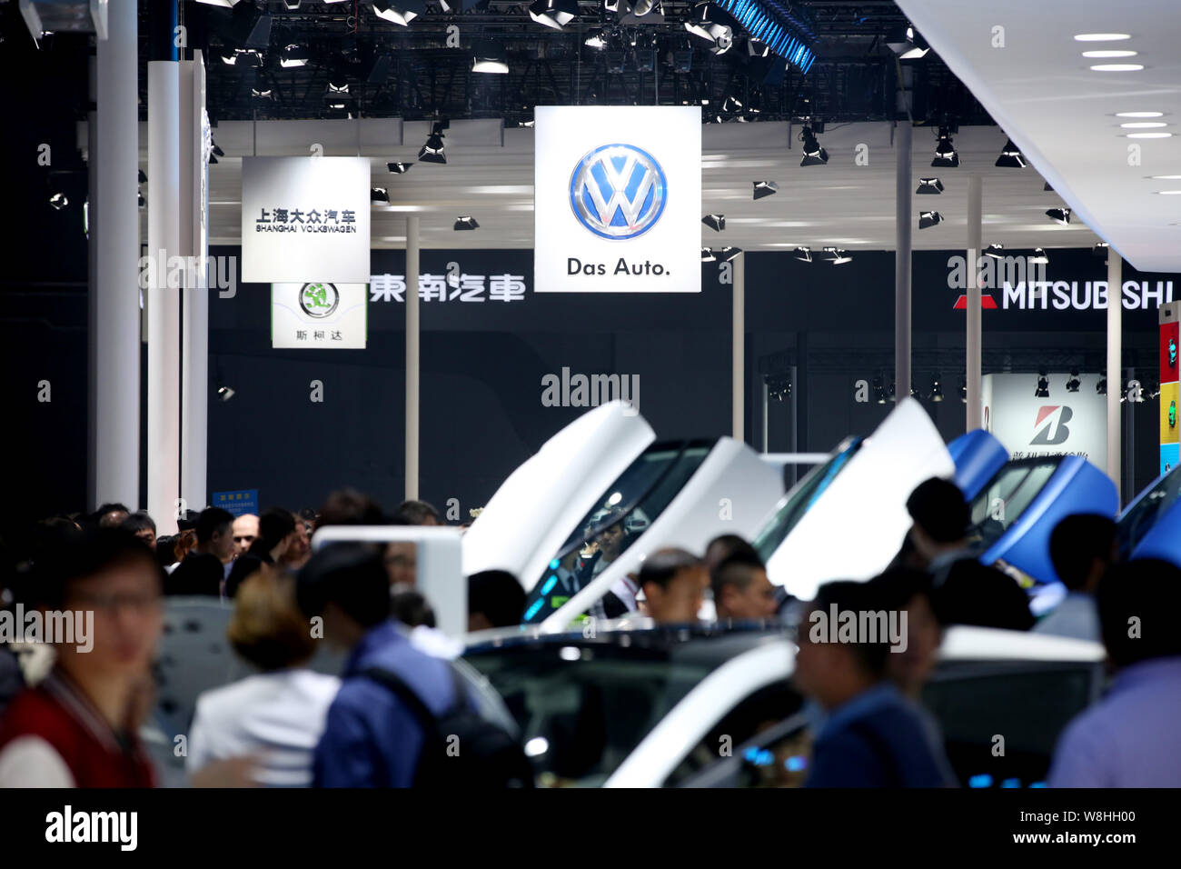 --FILE--People visit the stand of Shanghai Volkswagen, a joint venture ...