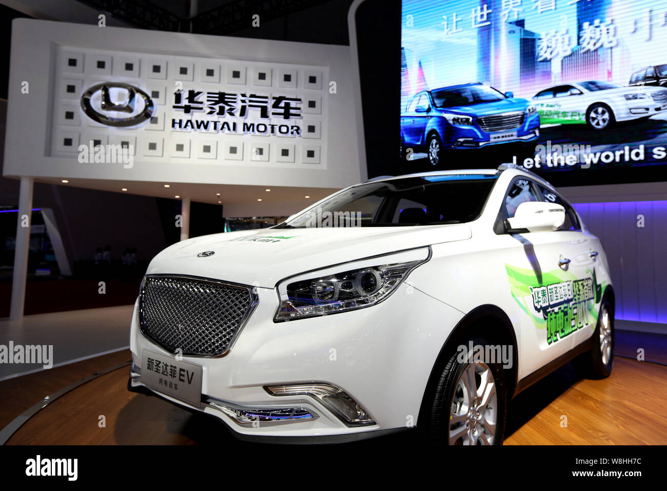 --FILE--A New Santafe electric vehicle of Hawtai Motor is on display ...