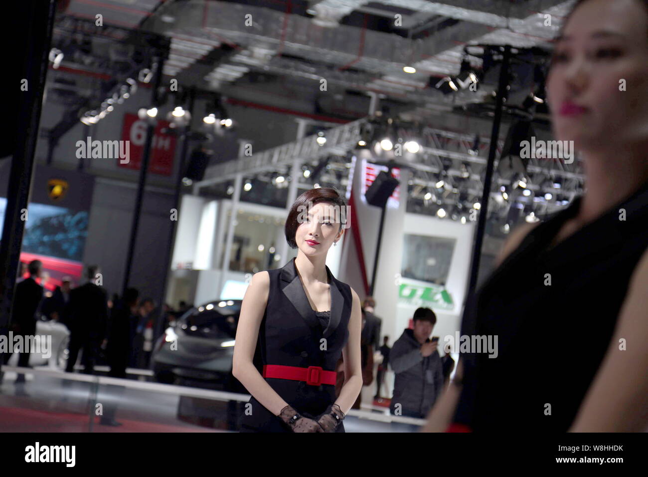Hostesses pose during the 16th Shanghai International Automobile ...