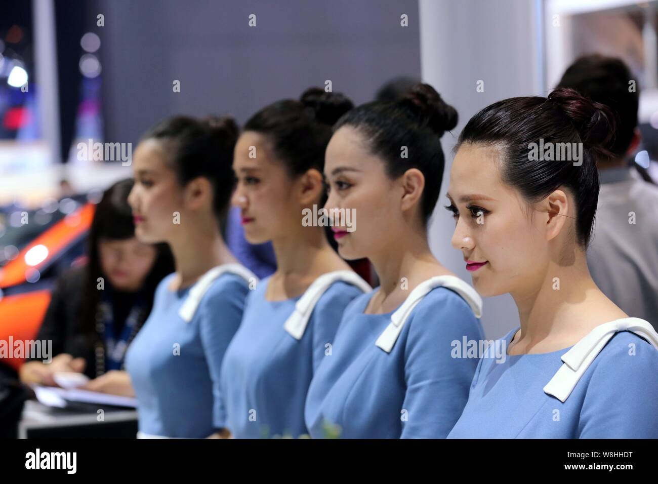 Hostesses pose during the 16th Shanghai International Automobile ...
