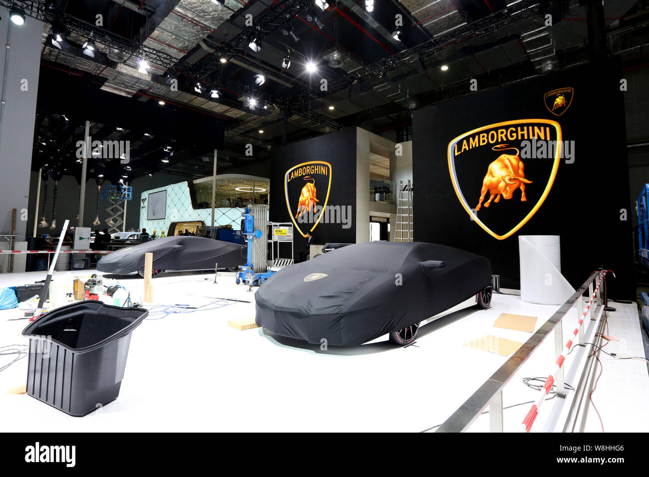 Lamborghini sports cars are covered in preparation for the 16th ...