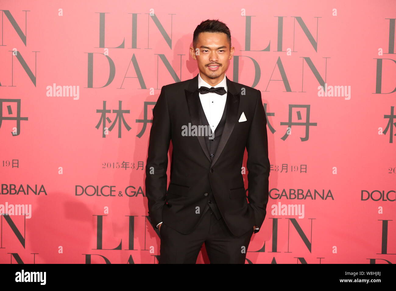 Chinese badminton star Lin Dan poses during the Dolce & Gabbana ...