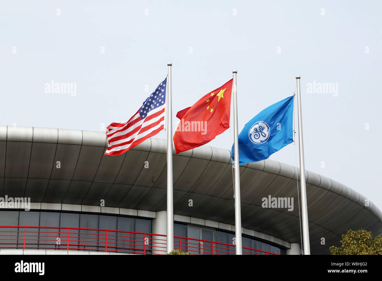 --FILE--Flags of U.S., China and GE (General Electric) flutter at GE ...
