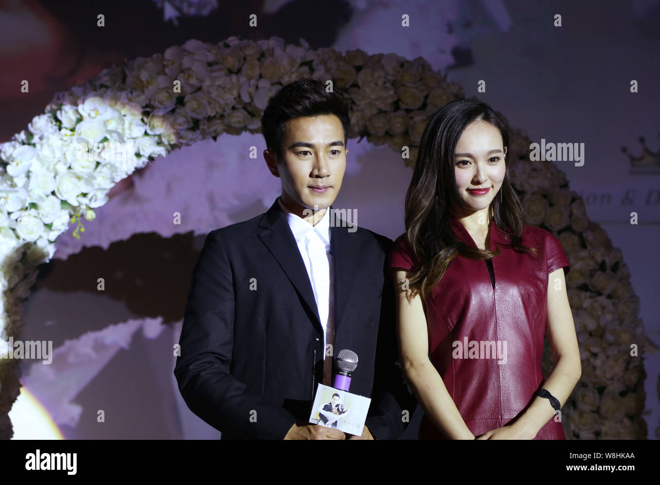 Chinese actress Tang Yan, right, and Hong Kong actor Hawick Lau attend ...