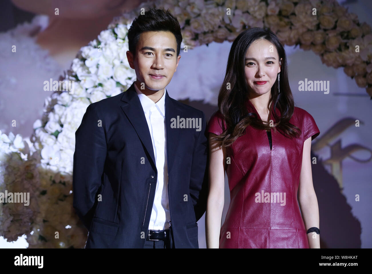 Chinese actress Tang Yan, right, and Hong Kong actor Hawick Lau attend ...
