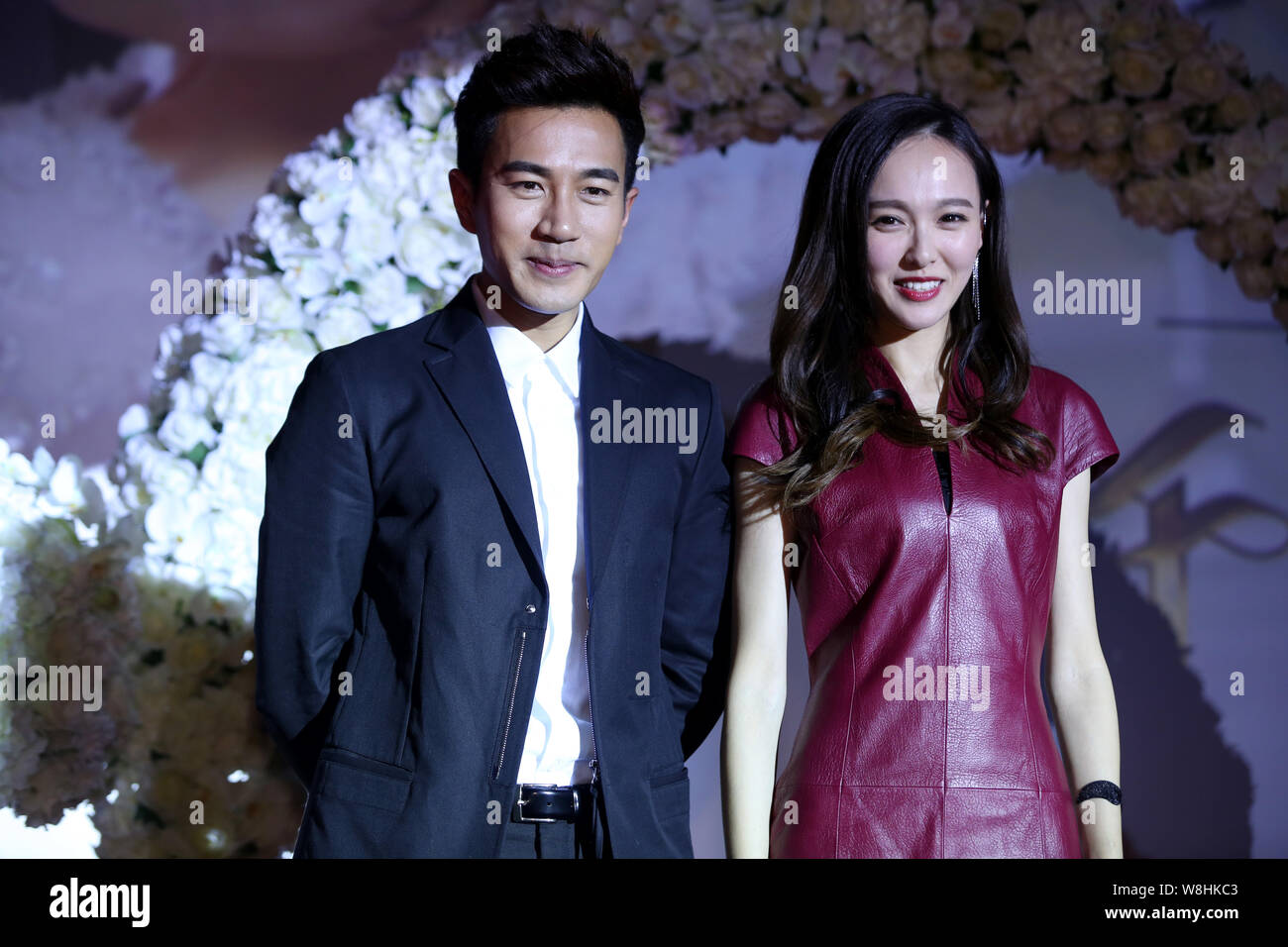 Chinese actress Tang Yan, right, and Hong Kong actor Hawick Lau attend ...