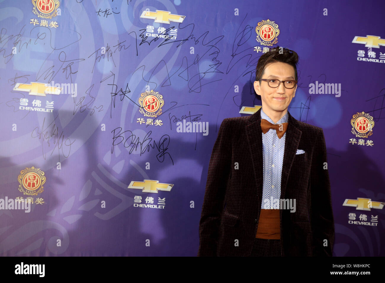 Taiwanese singer Terry Lin poses on the red carpet as he arrives for ...