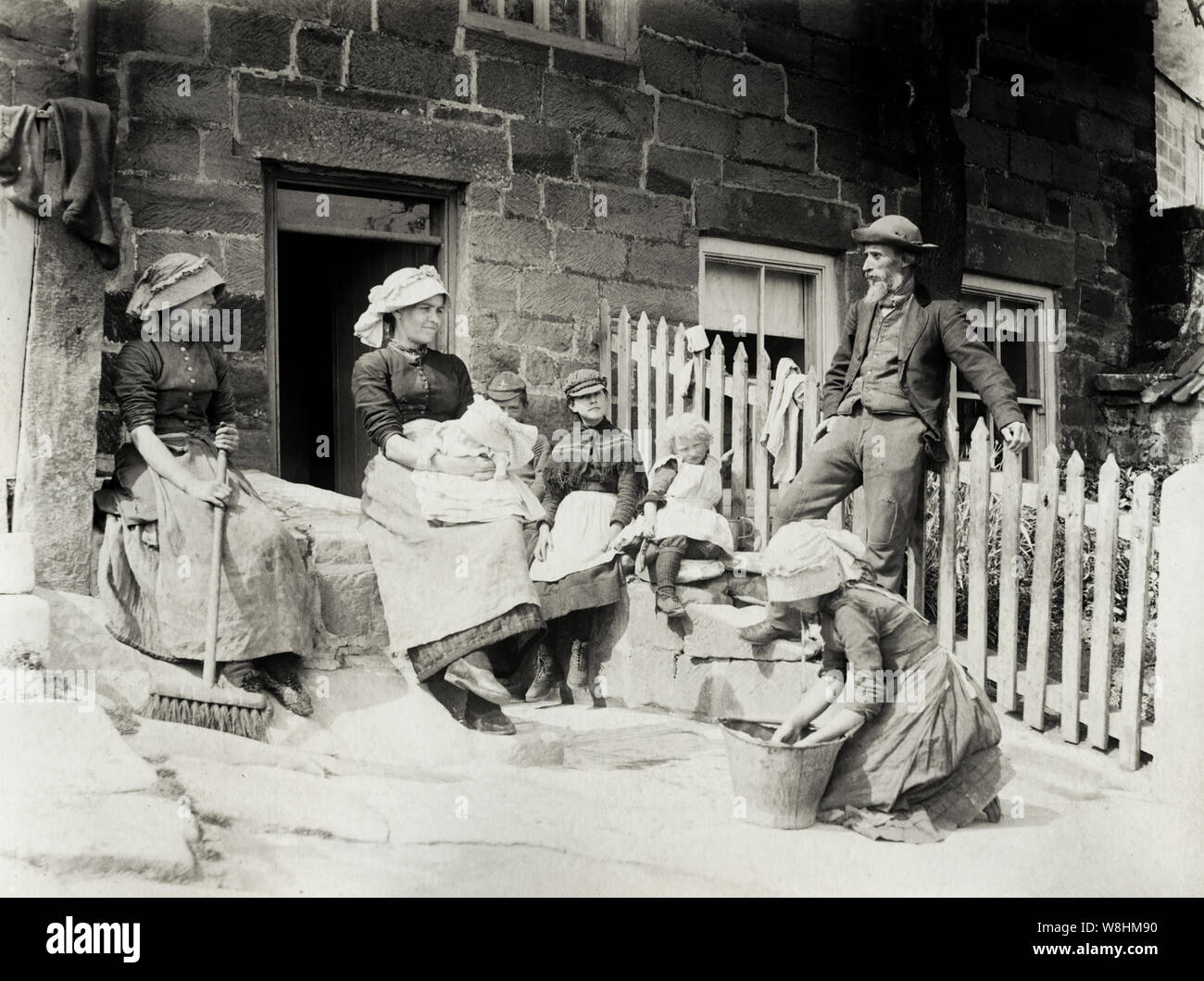 19th century vintage photograph - Working family outside their cottage ...