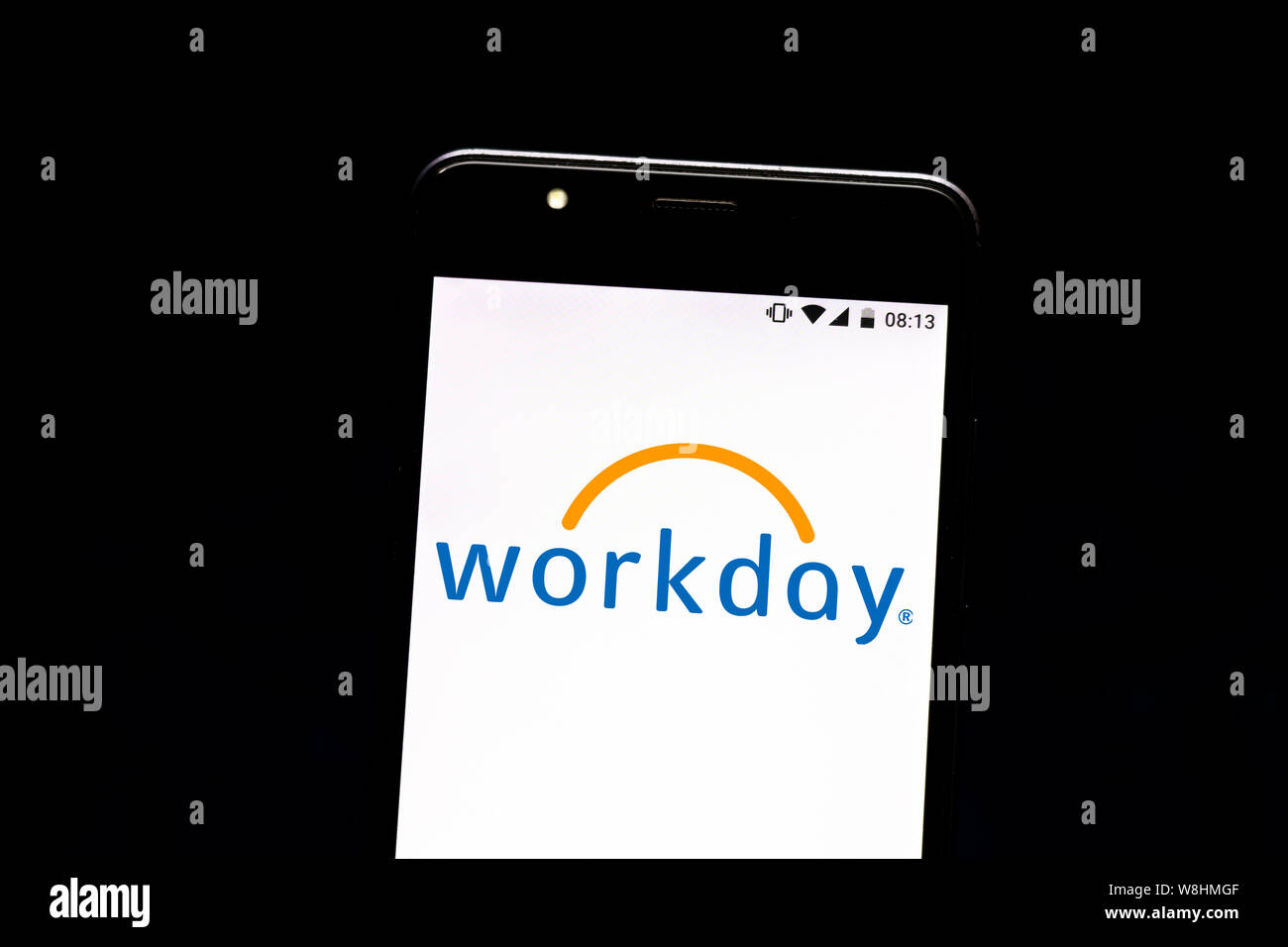 In this photo illustration the Workday logo is seen displayed on a ...