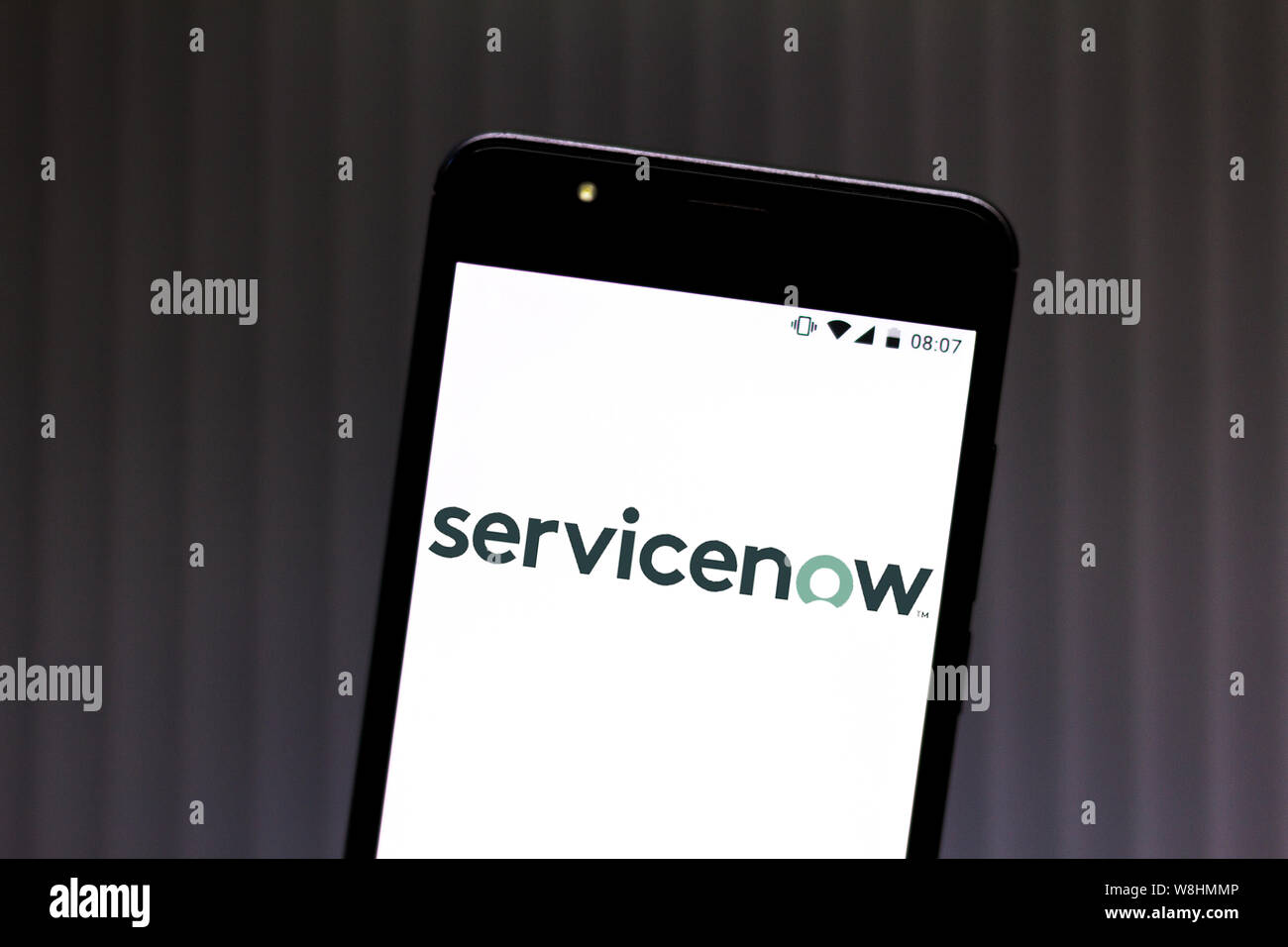 In this photo illustration the ServiceNow logo is seen displayed on a ...