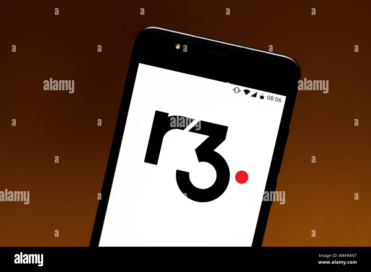 In this photo illustration the R3 LLC logo is seen displayed on a ...