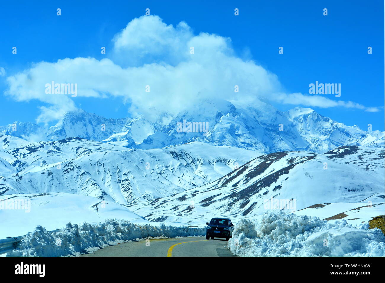 --FILE--Landscape of the China National Highway 318 along snow ...