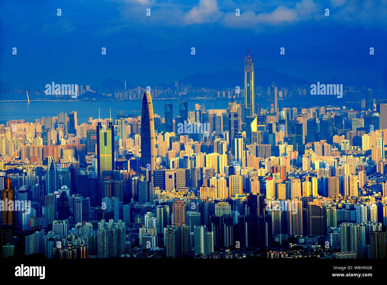 --FILE--Cityscape of downtown areas with clusters of skyscrapers and ...