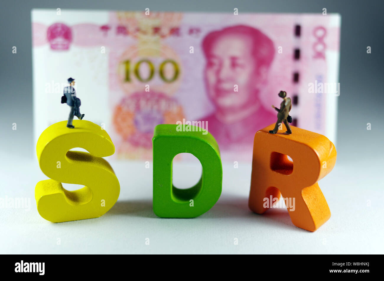 Illustration of RMB (renminbi) yuan banknotes and SDR (Special Drawing ...