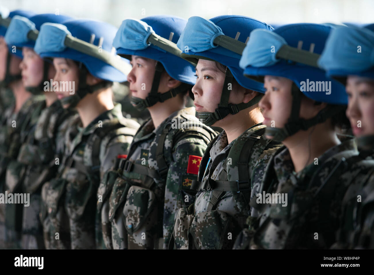 --FILE--Female Chinese peacekeepers line up during a departure ceremony ...