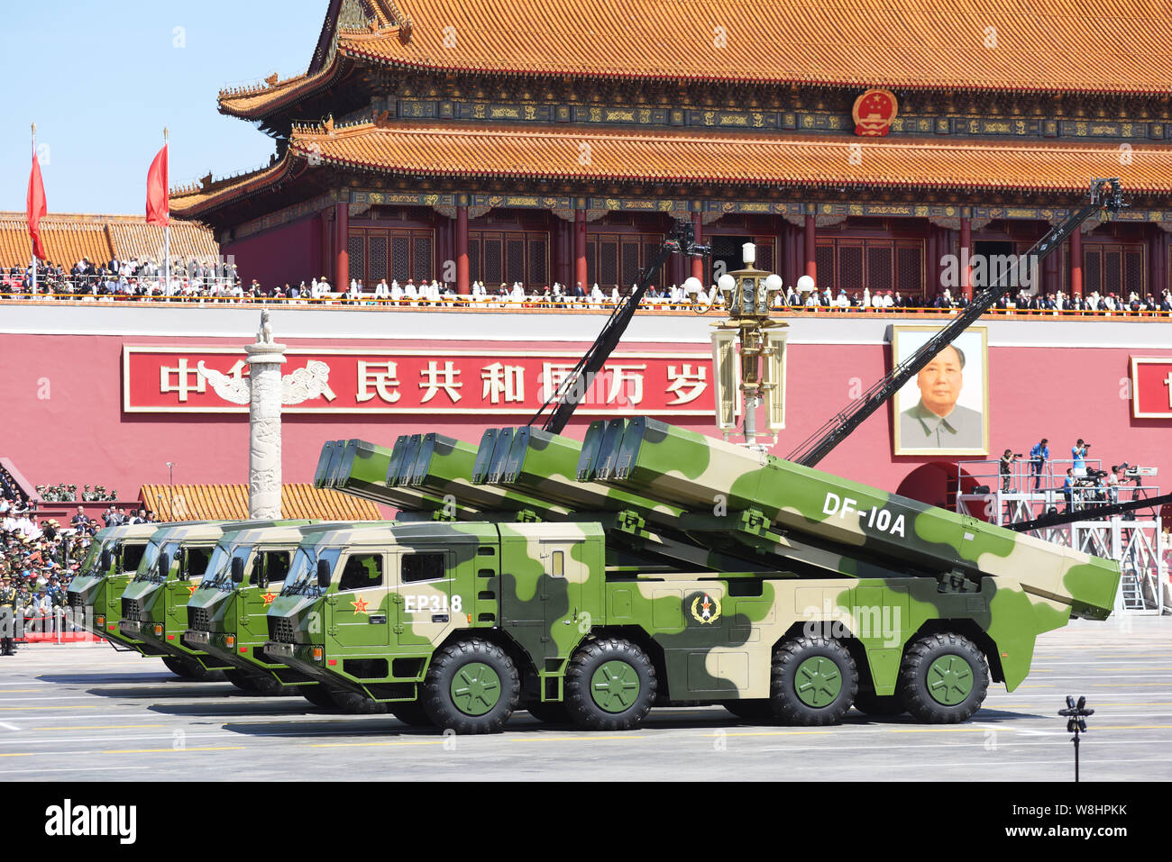 Military vehicles carrying DF-10A cruise missiles march past the ...