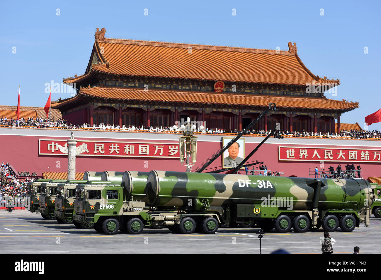 Military vehicles carrying DF-31A intercontinental ballistic missiles ...