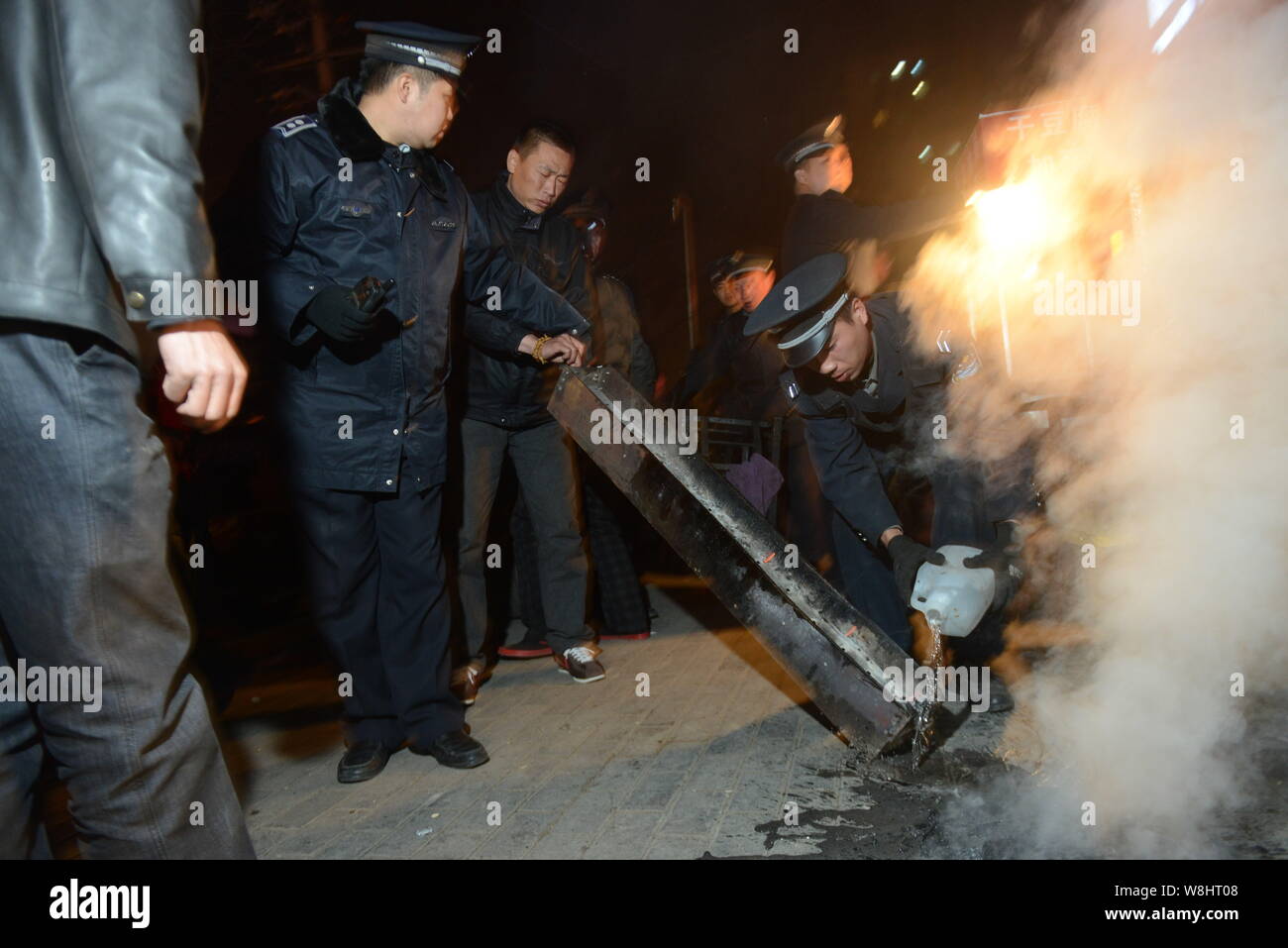 --FILE--Chinese officers from the Beijing Municipal Bureau of City ...