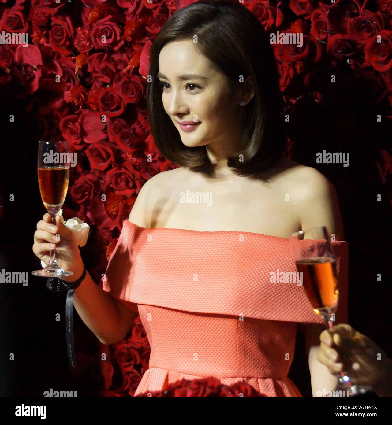 Chinese actress Yang Mi poses during the opening ceremony for a new ...