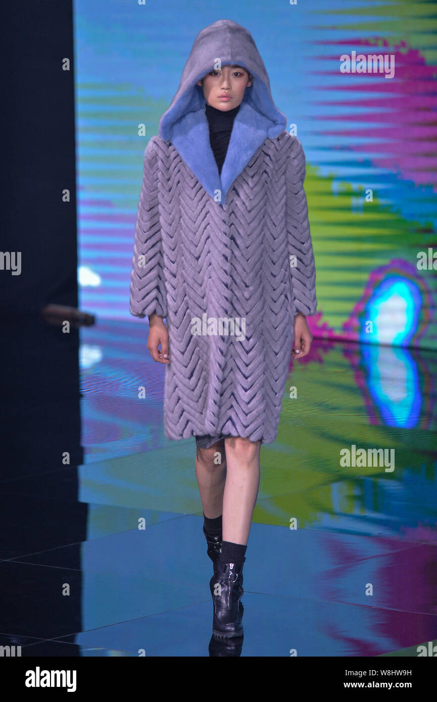 A model displays a new creation by Chinese fashion designer Fan Ran at ...