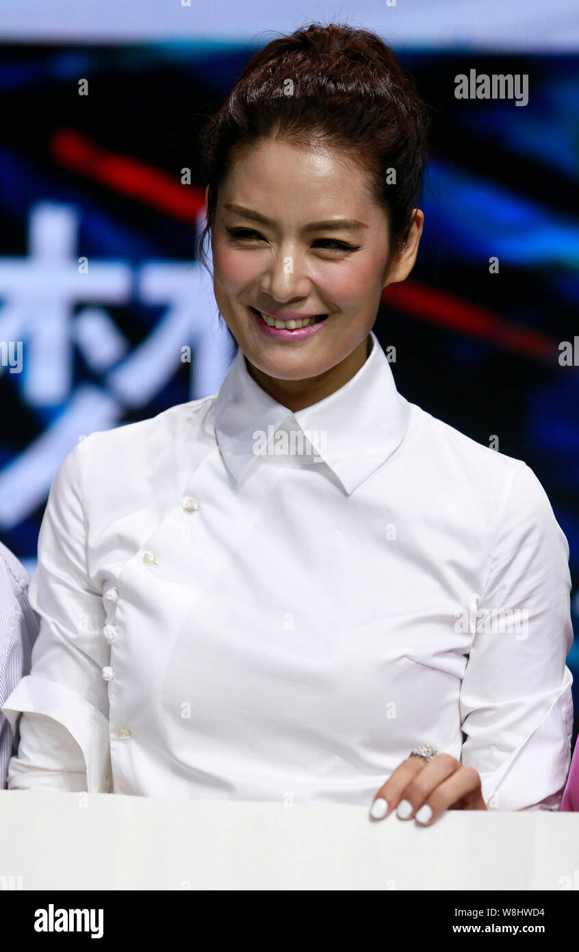 Chinese fashion designer Mary Ma reacts in the fashion show of Maryma ...