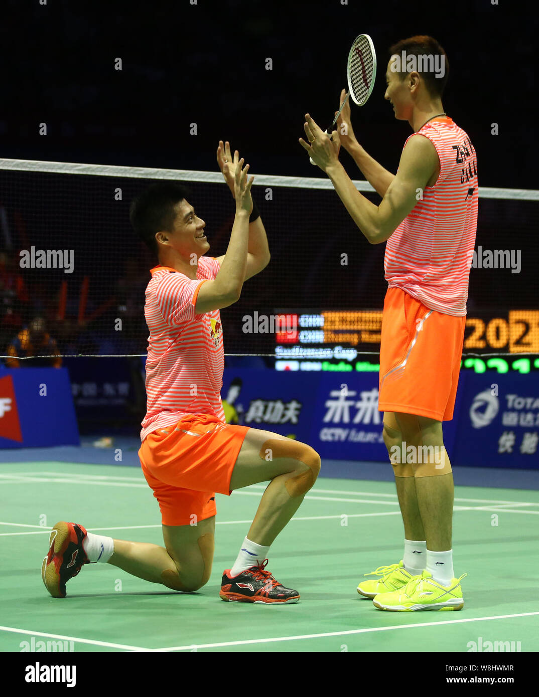 Fu Haifeng, left, and Zhang Nan of China celebrate after defeating ...