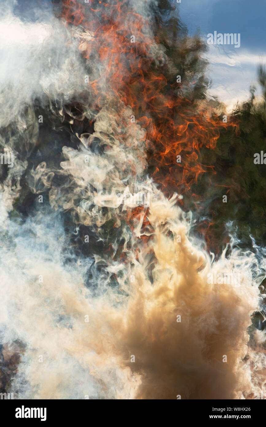 Smoke and flames, fire background Stock Photo - Alamy